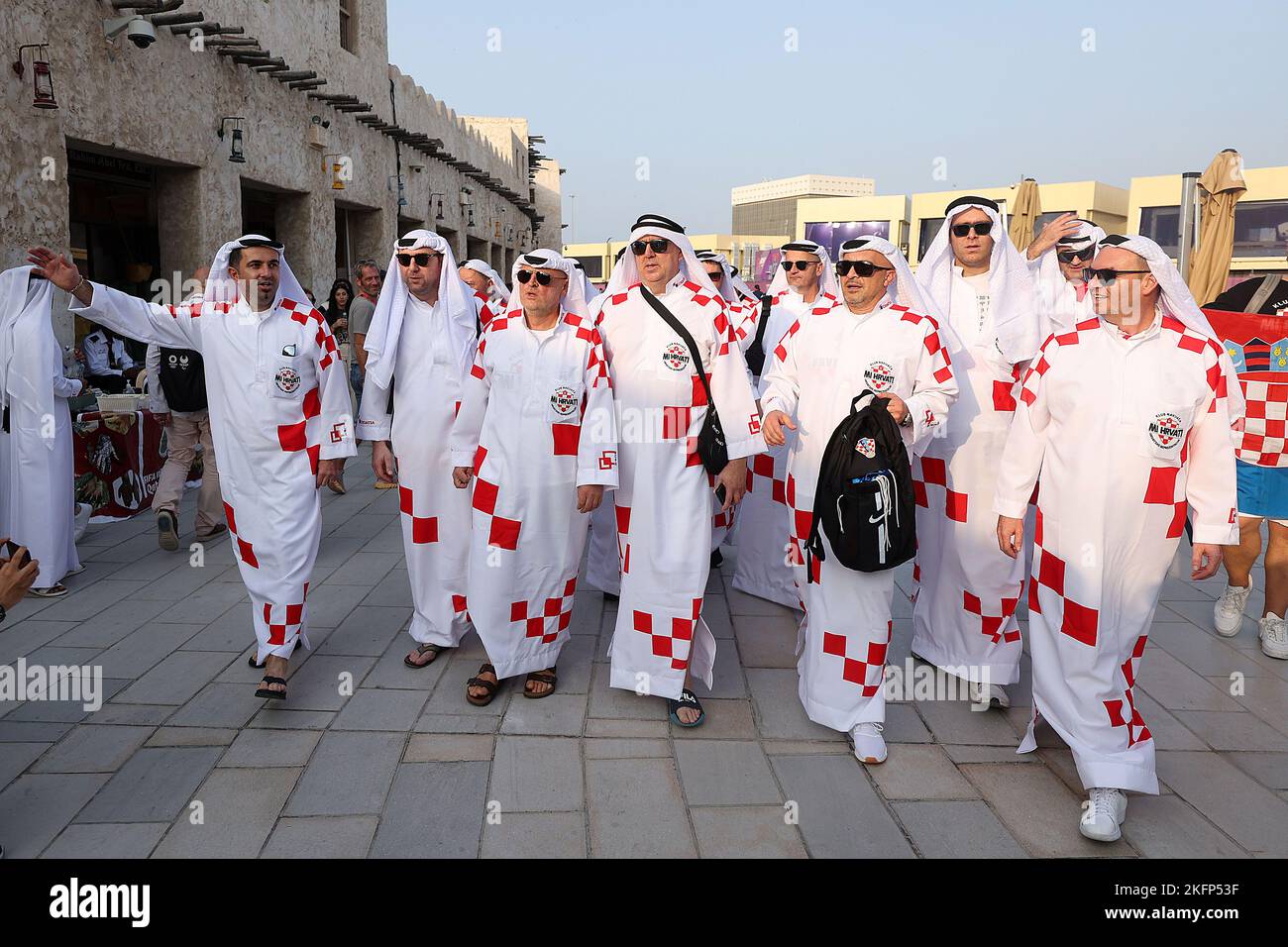 Doha, Qatar on November 19, 2022. Croatian fans in traditional Qatari ...