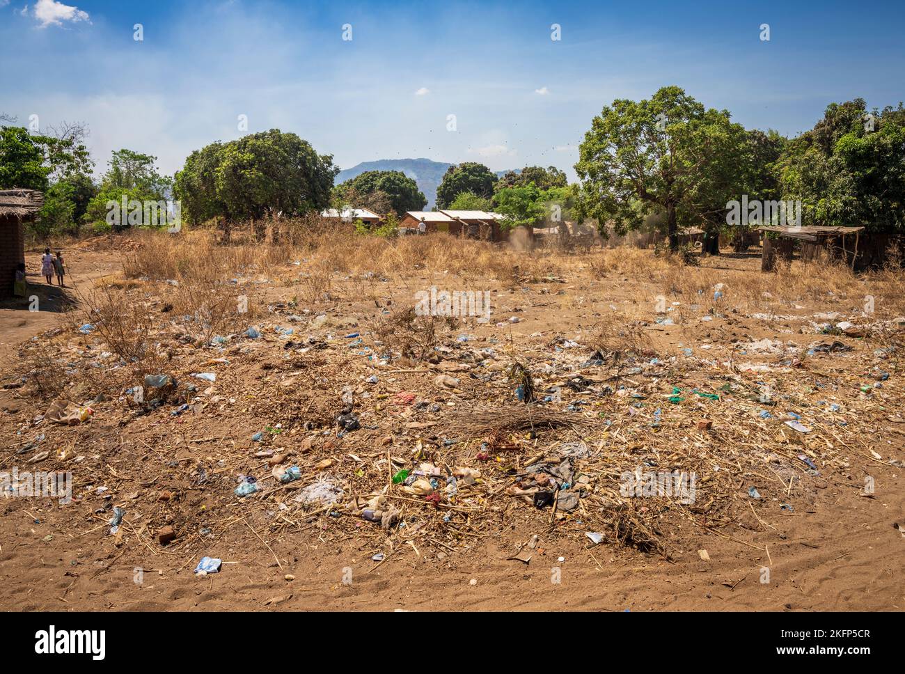 Plastic waste / litter by the roadside in a village in rural Malawi ...