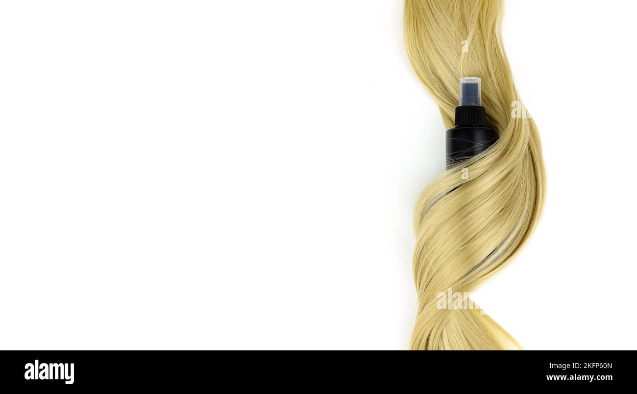 Different professional hairdresser tools hair spray and strand of ...