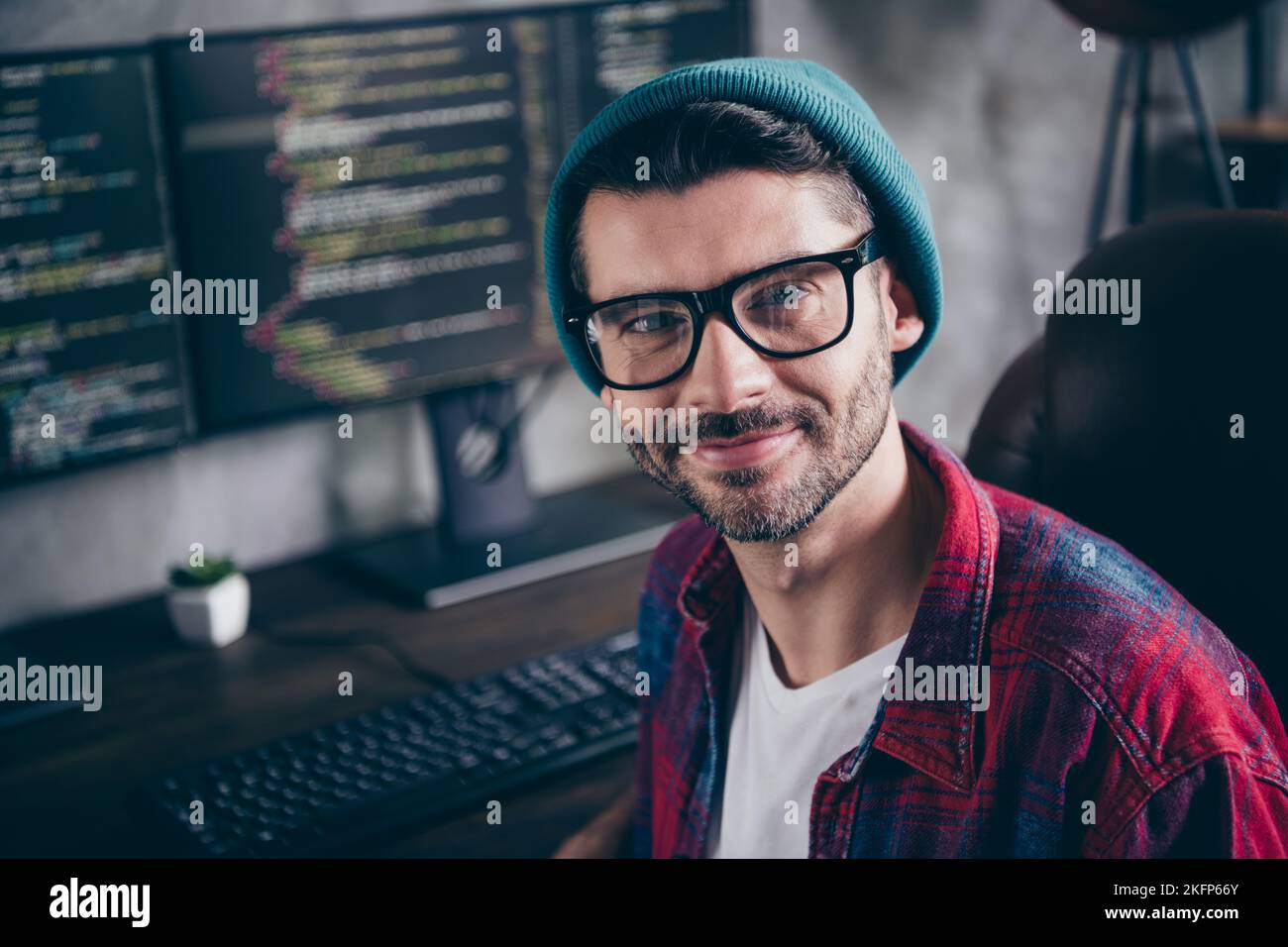 Photo of intelligent smart programmer wear spectacles creating safety ...