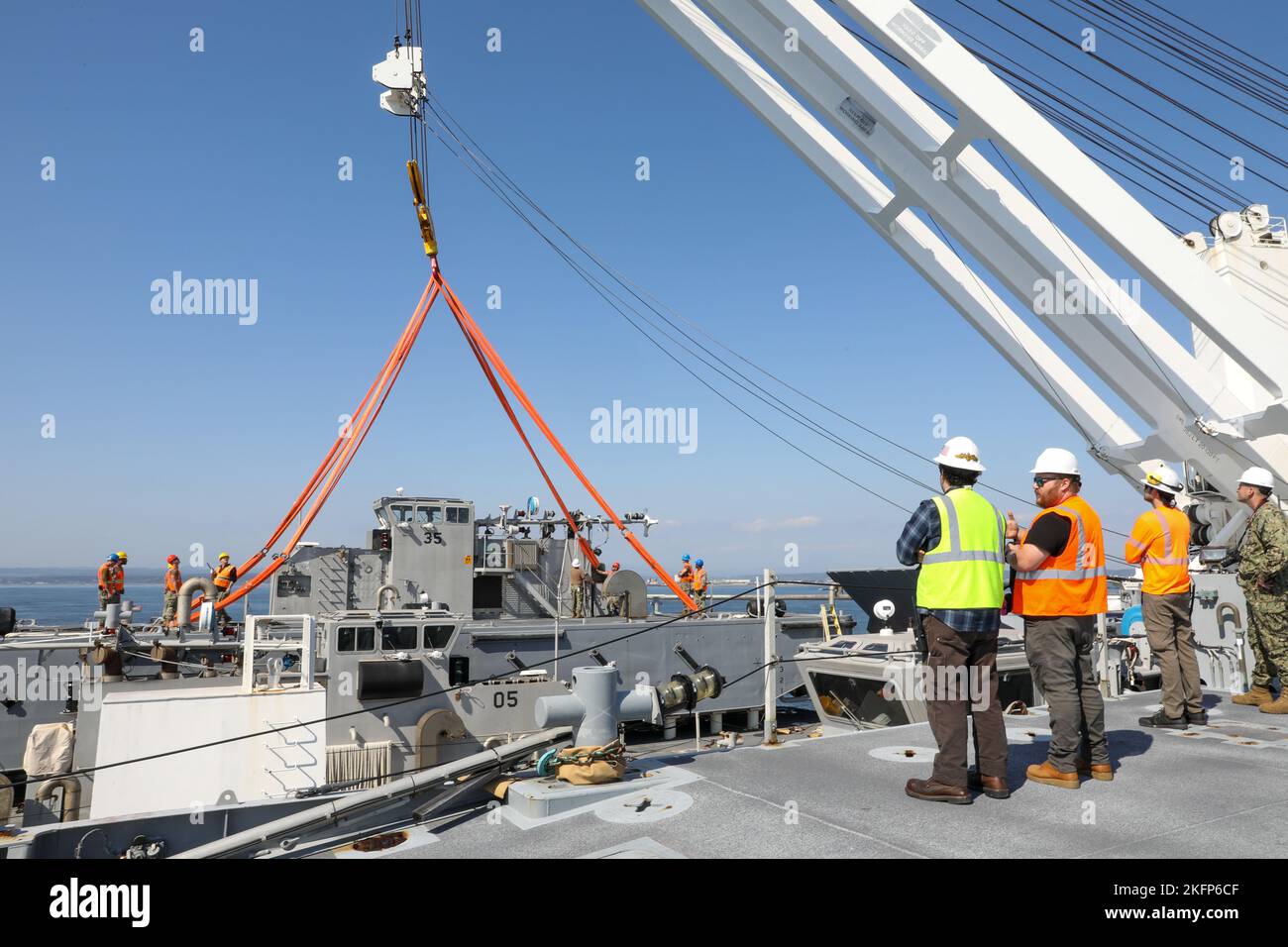 U.S. Merchant Mariners with Military Sealift Command oversee operations ...