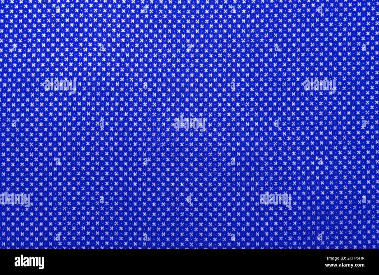 The cloth. Blue fabric background. Material for sewing clothes. Pattern ...