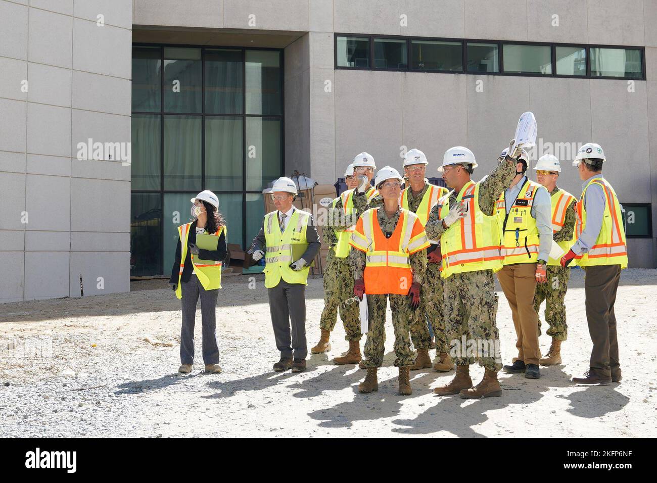 Rear Adm. Lore Aguayo (center), commander, NAVFAC Atlantic, and Lt ...