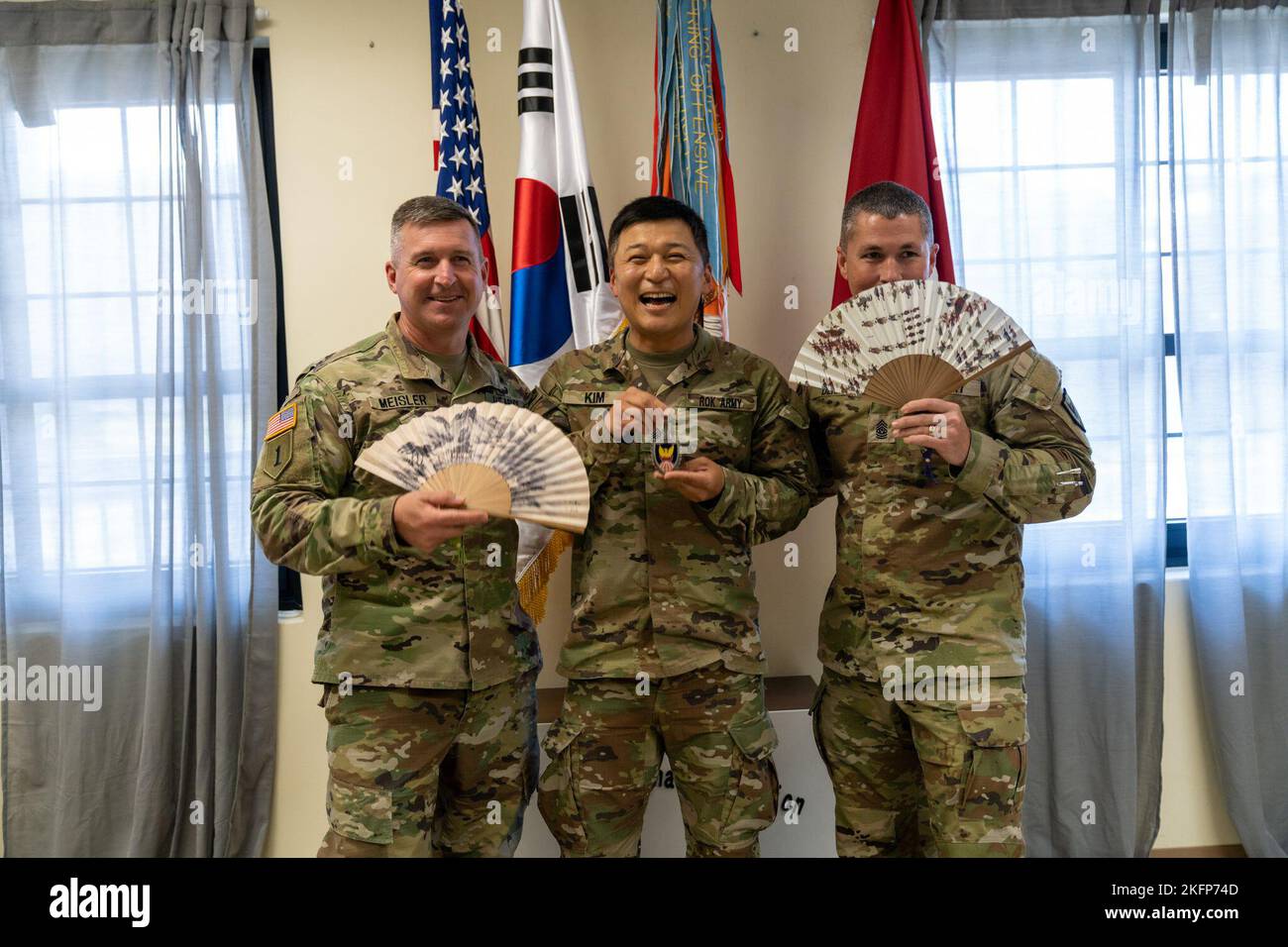Command Team of 311th Signal Command receiving a cultural present from ...