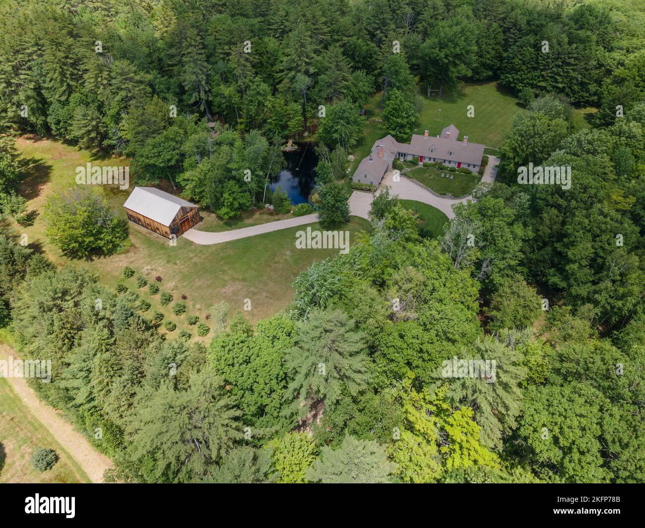 An areal shot of buildings surrounded by greenery in the daylight Stock ...