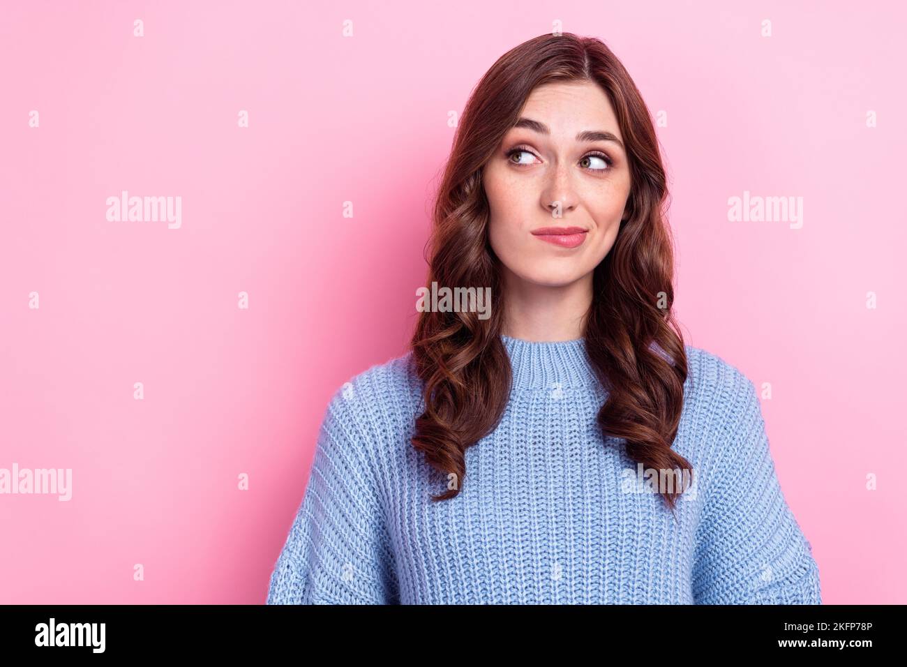 Portrait photo of charming lady curly hairstyle wear blue knit sweater ...