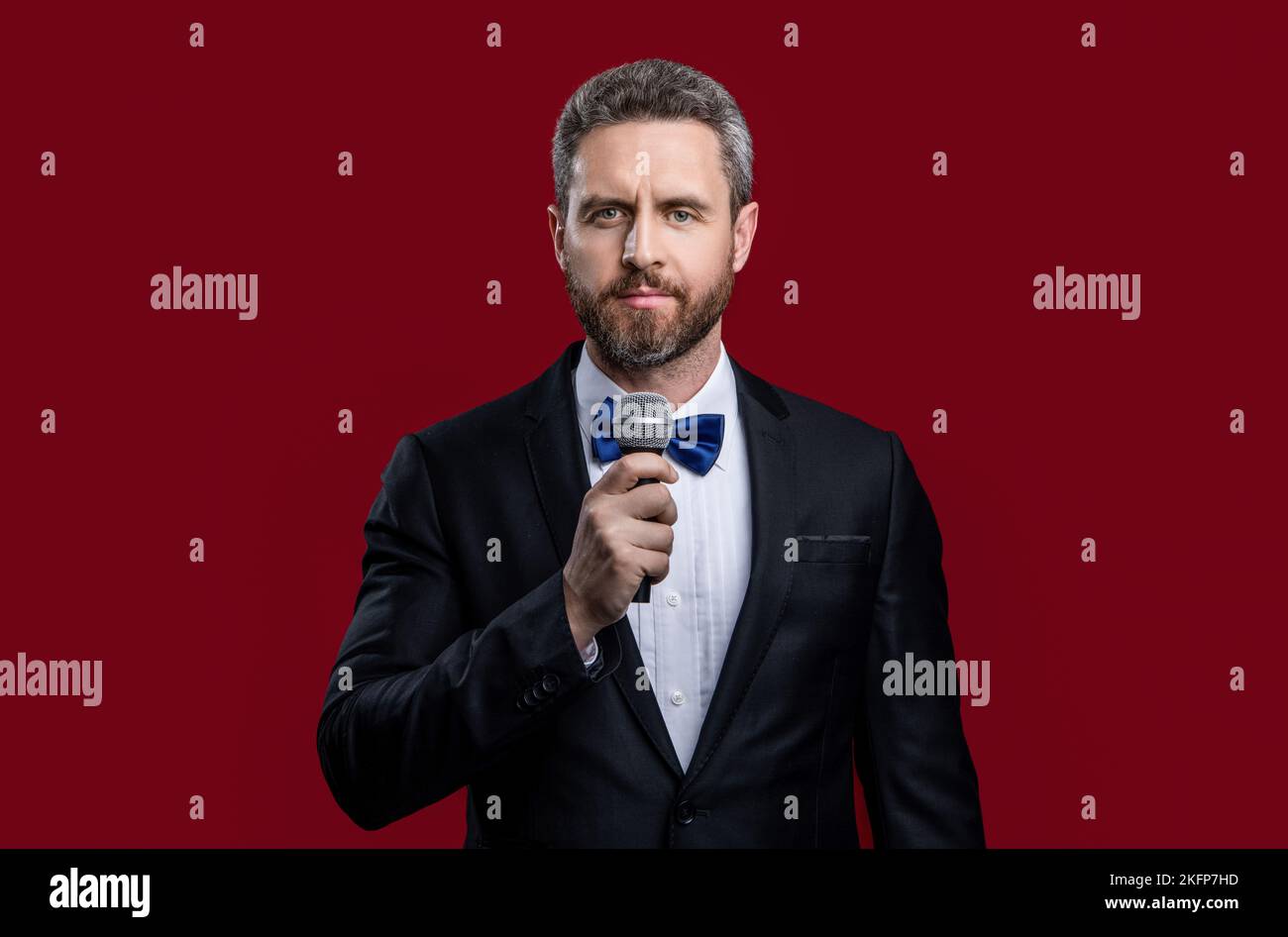 tuxedo man presenter with microphone. photo of man presenter in tuxedo ...