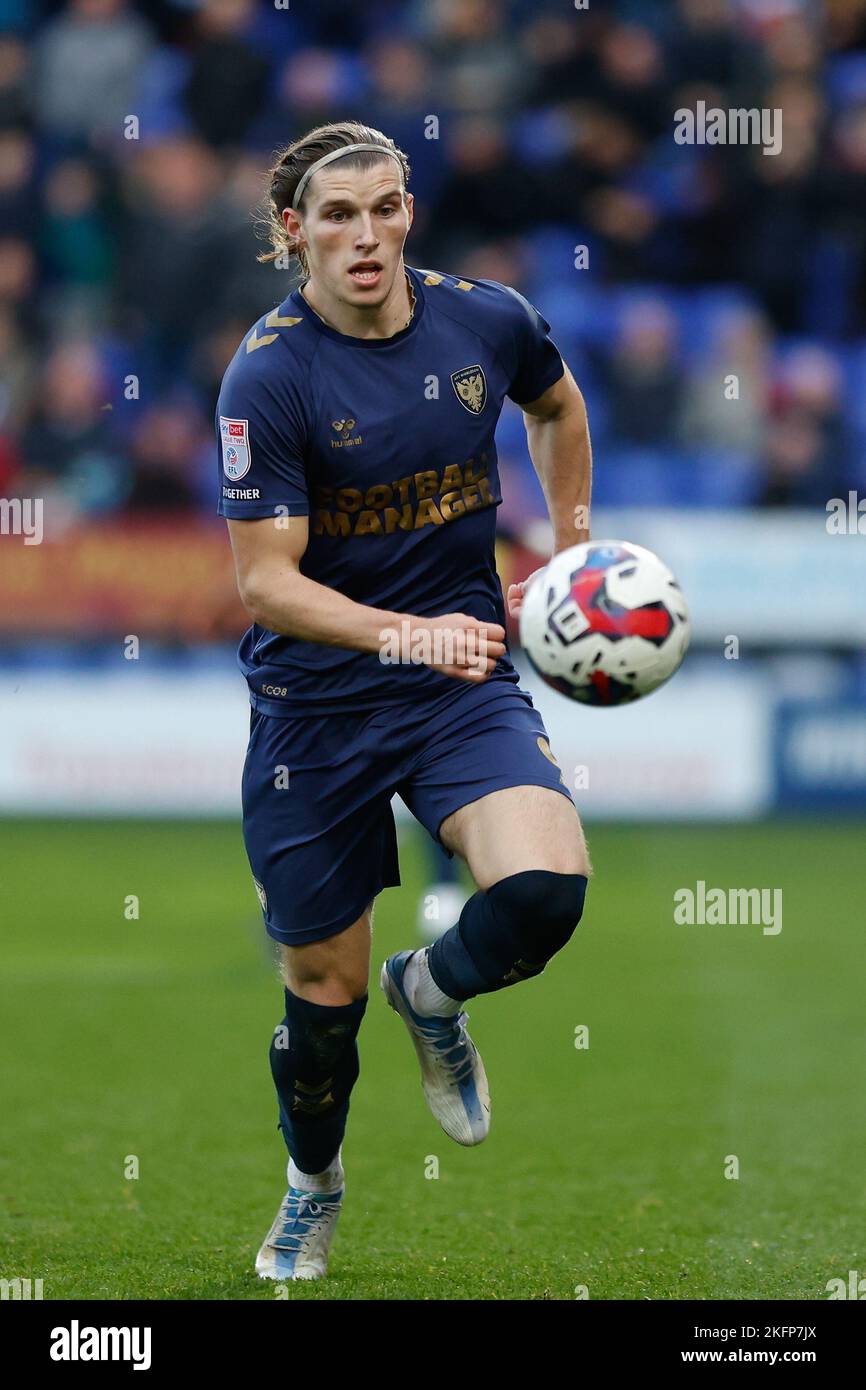 Josh Davison #9 of AFC Wimbledon runs with the ball during the Sky Bet ...