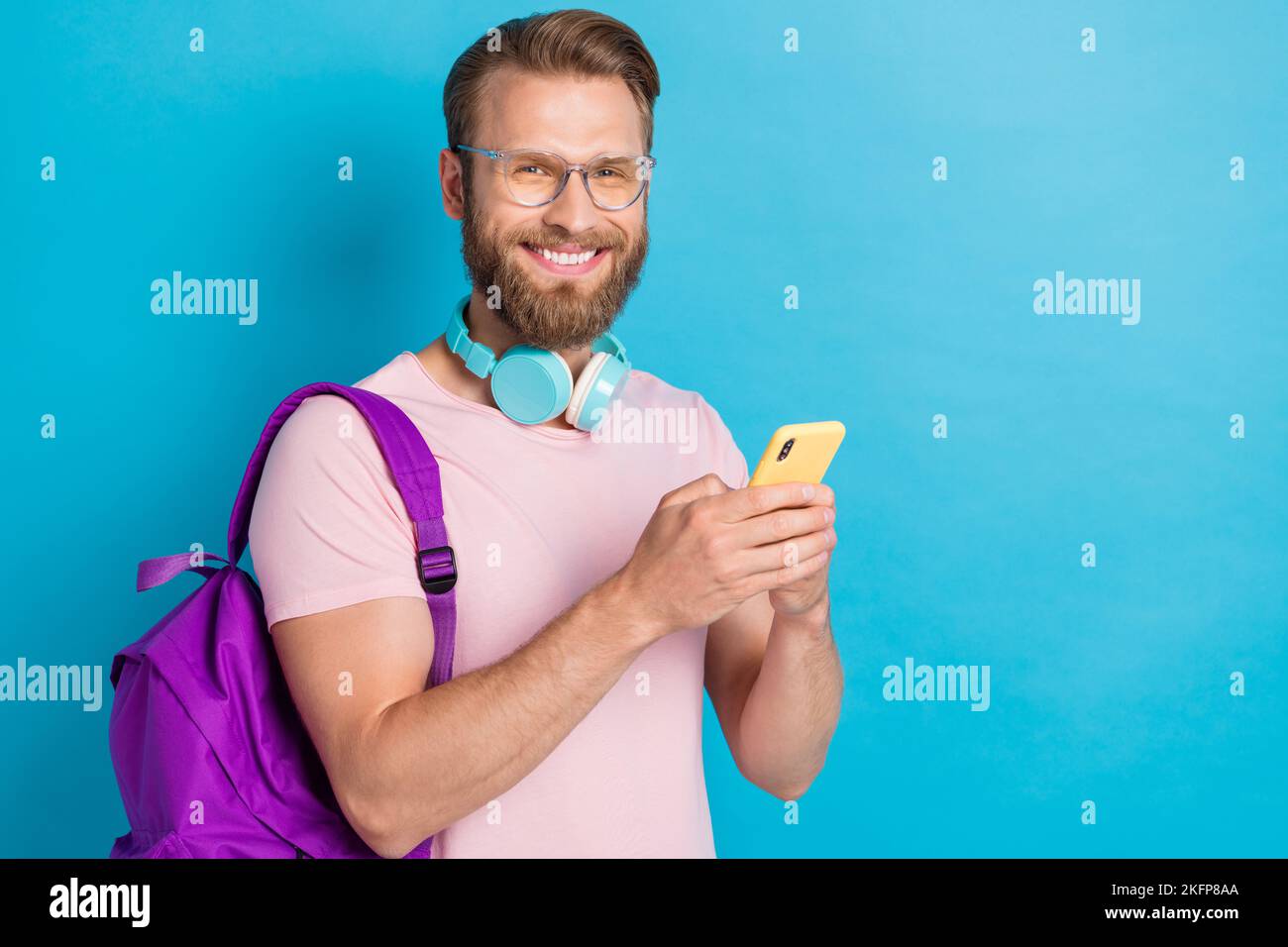 Photo portrait of nice young guy hipster specs student gadget dressed ...