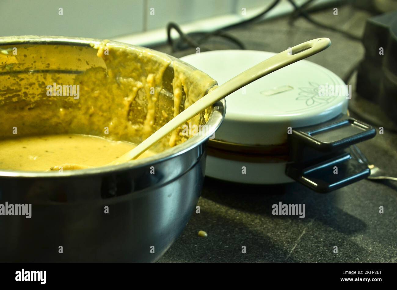 a wafer baked from paste in a waffle iron Stock Photo - Alamy