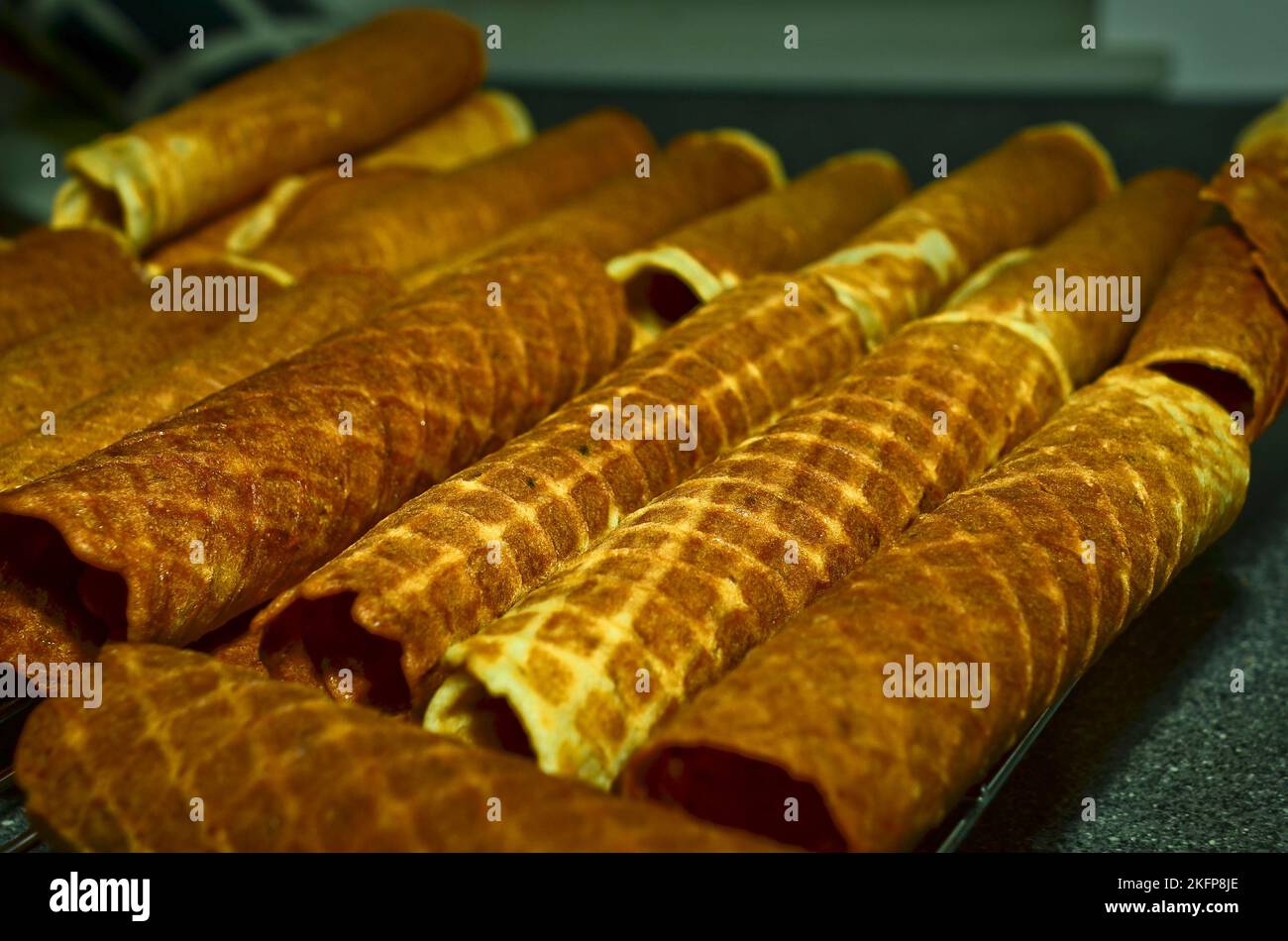 a wafer baked from paste in a waffle iron Stock Photo - Alamy