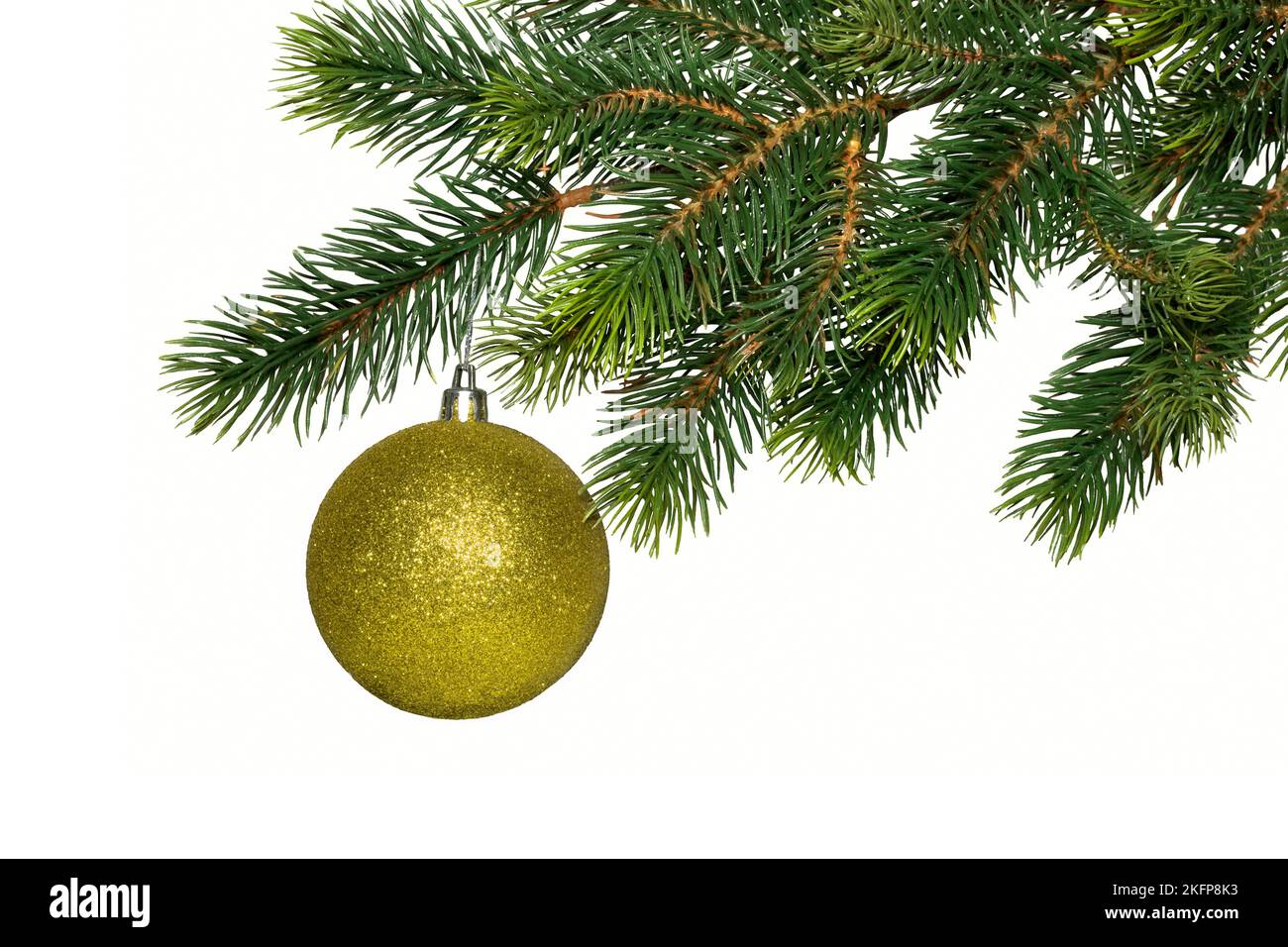 Christmas tree decorated with golden ball isolated over white ...