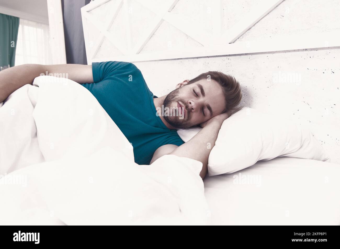 Tips sleeping better. Bearded man sleeping face relaxing. Maintaining ...