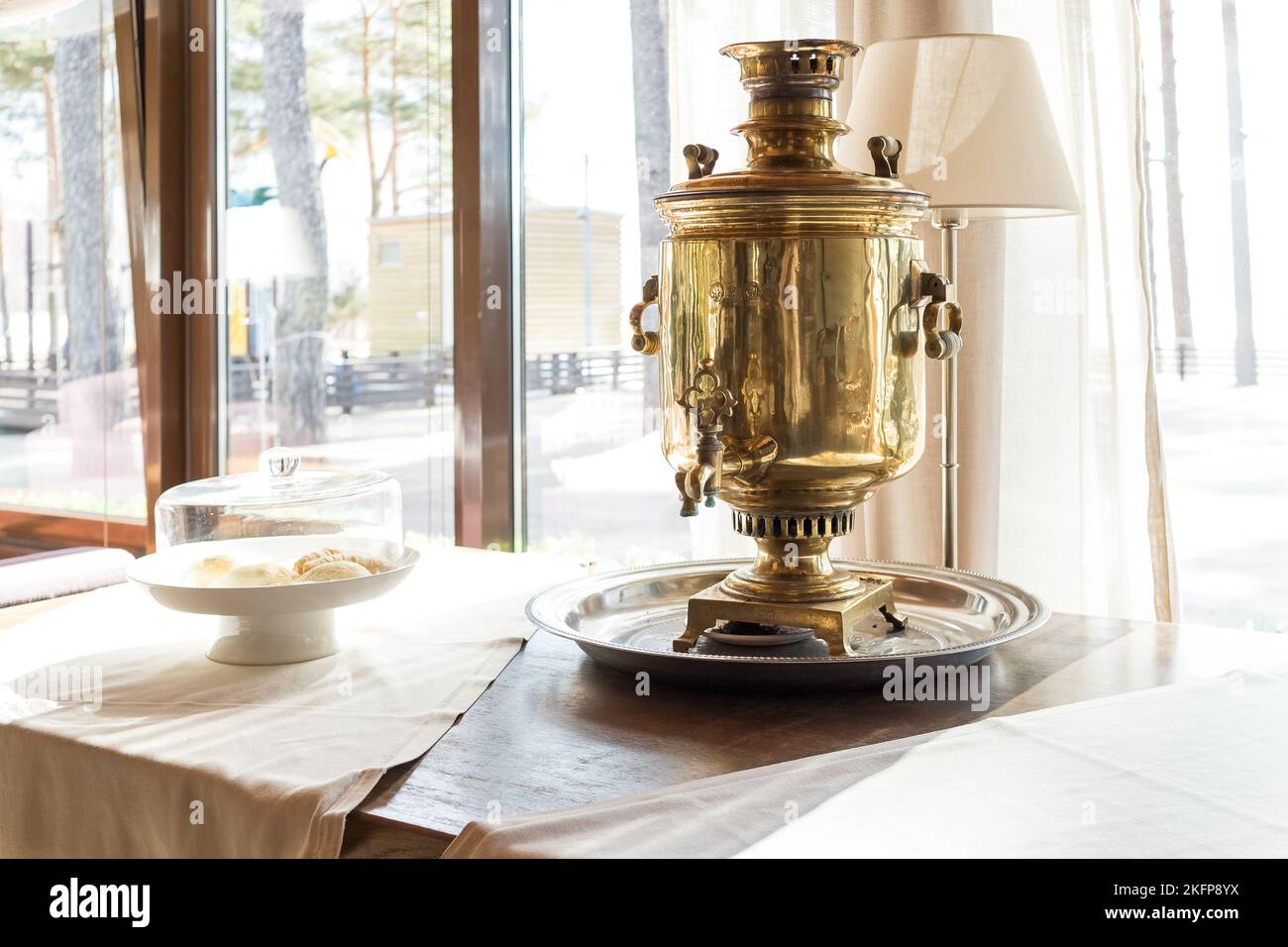 Traditional Russian samovar on table. Space for text.Metal samovar on ...