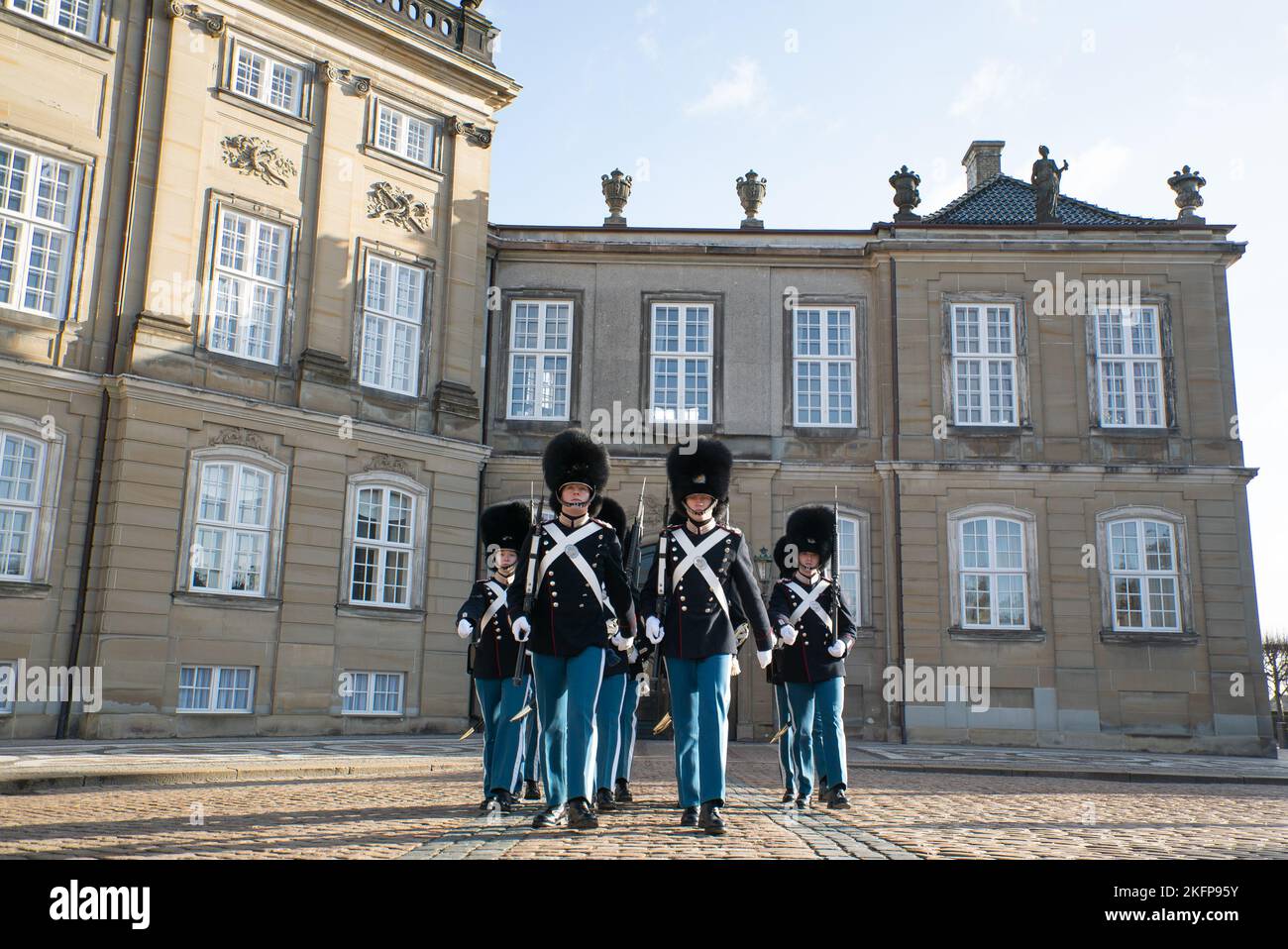Royal Guards (Kongelige Livgardes) marching during "Changing the Guard" Amalienborg Palace ...