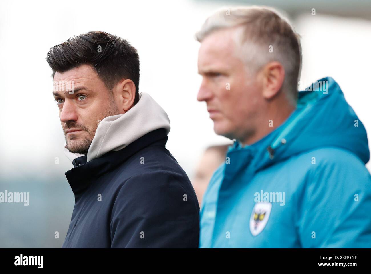 Johnnie Jackson manager of AFC Wimbledon watches on during the Sky Bet ...