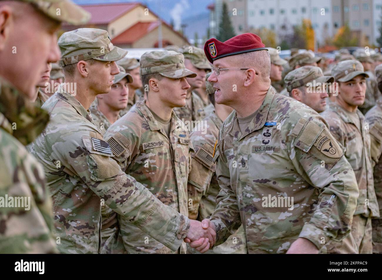 Command Sgt. Maj. Vern B. Daley, center, 11th Airborne Division Senior ...