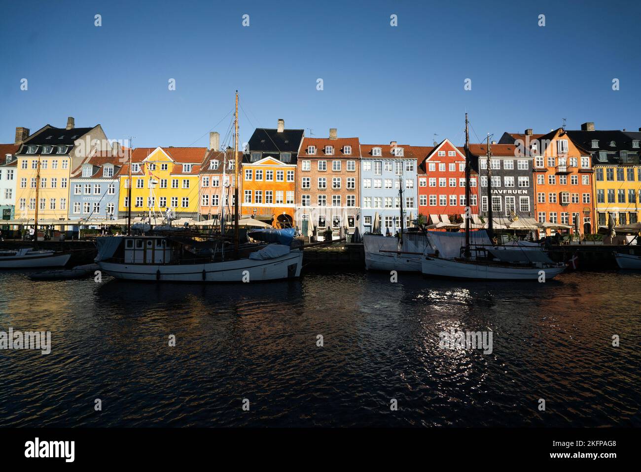 The colourful streets of Copenhagen, Denmark, along Nyhavn Quayside, on ...