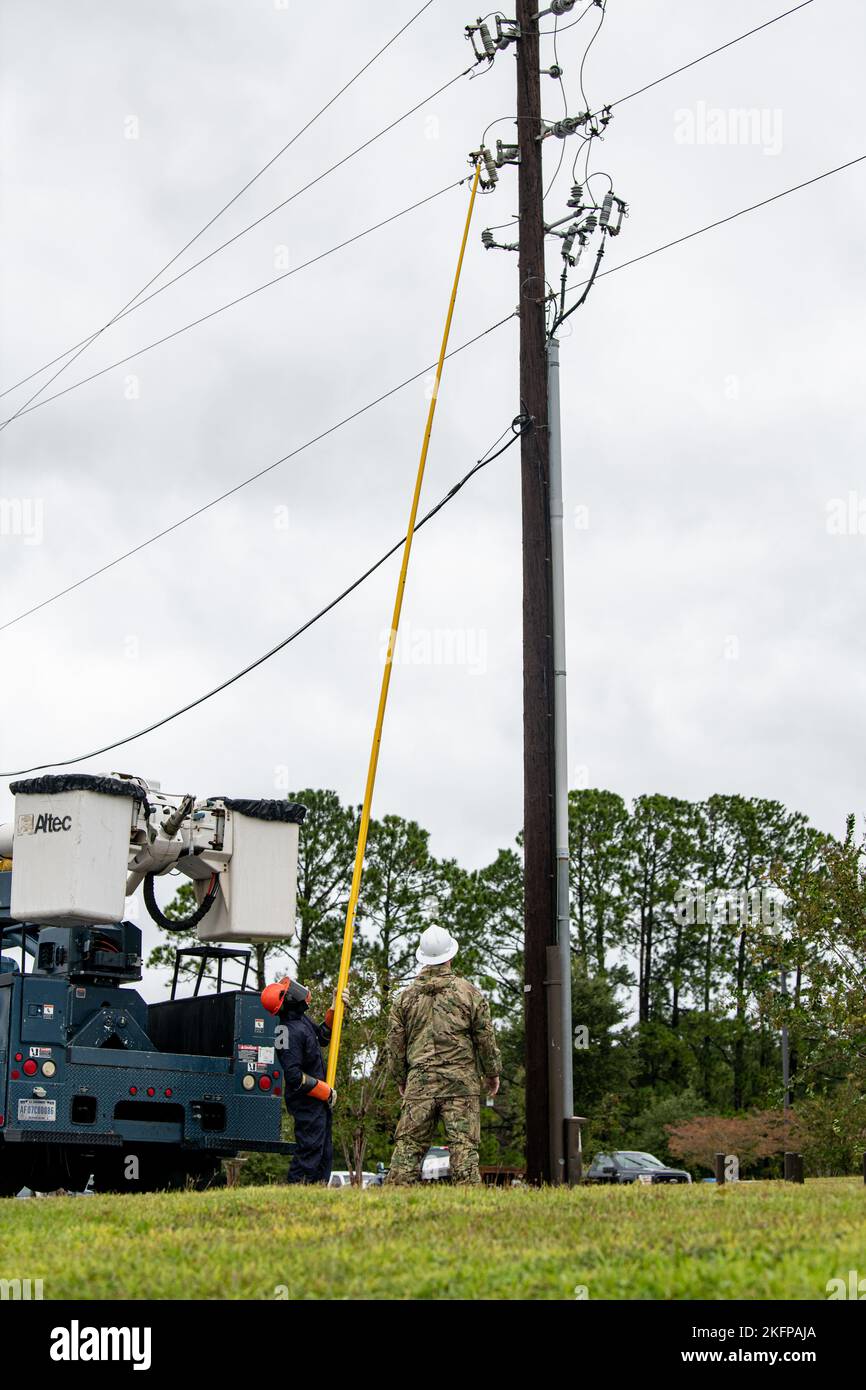 U.S. Air Force Airmen with the 628th Civil Engineer Squadron replace a ...