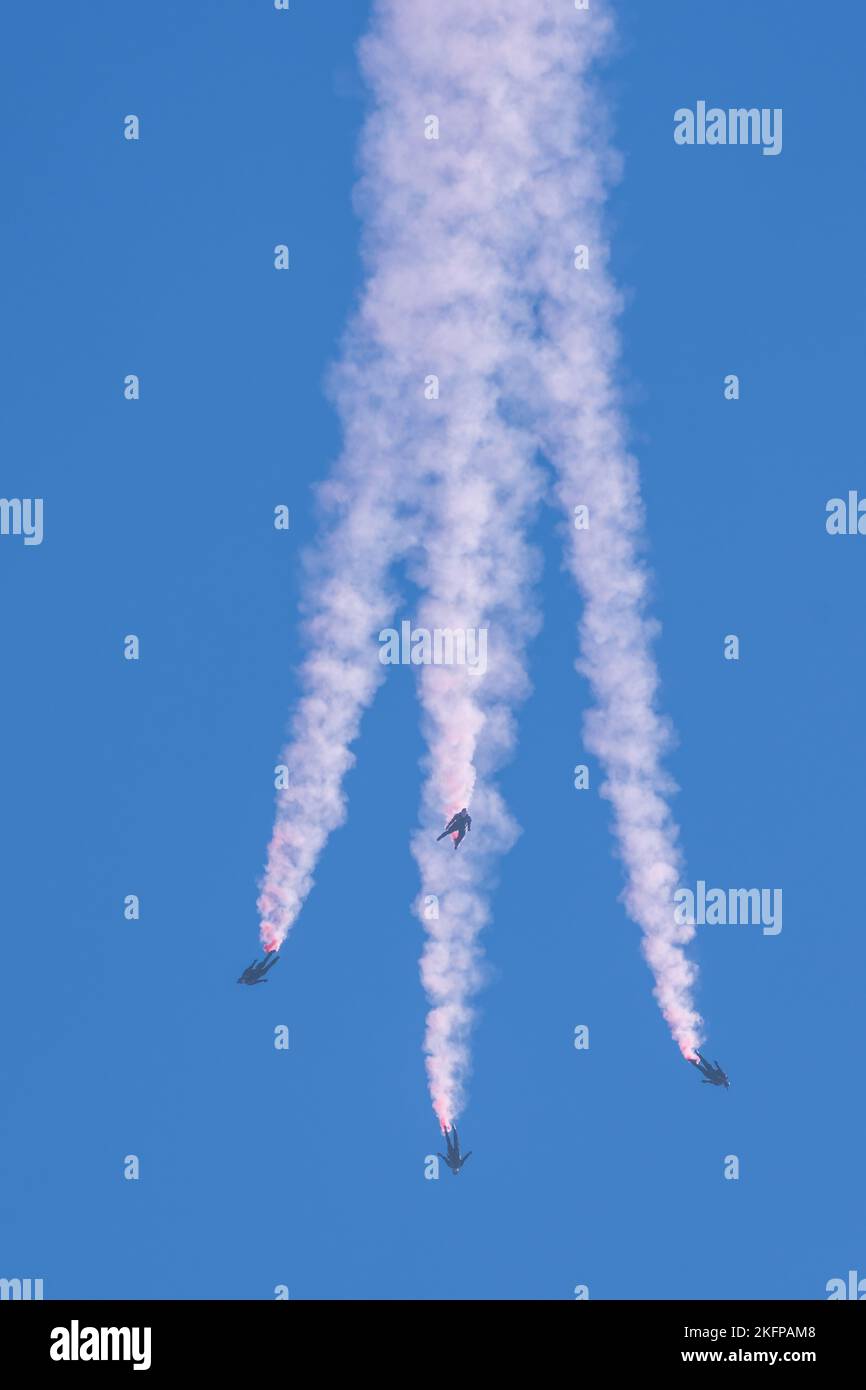 Members of the U.S. Army Parachute Team in free fall are separating to ...