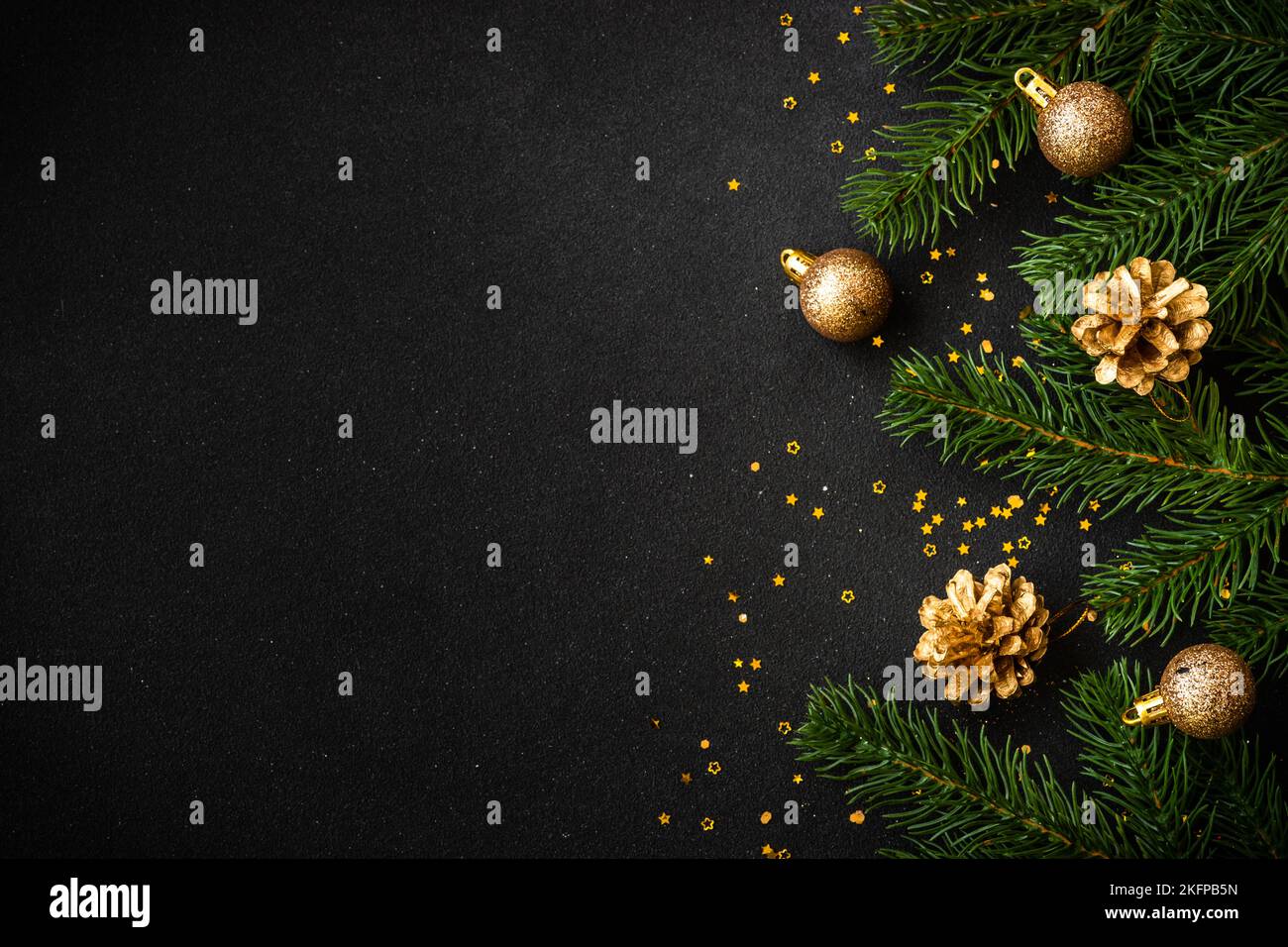 Christmas flat lay background with holiday decorations on black Stock ...