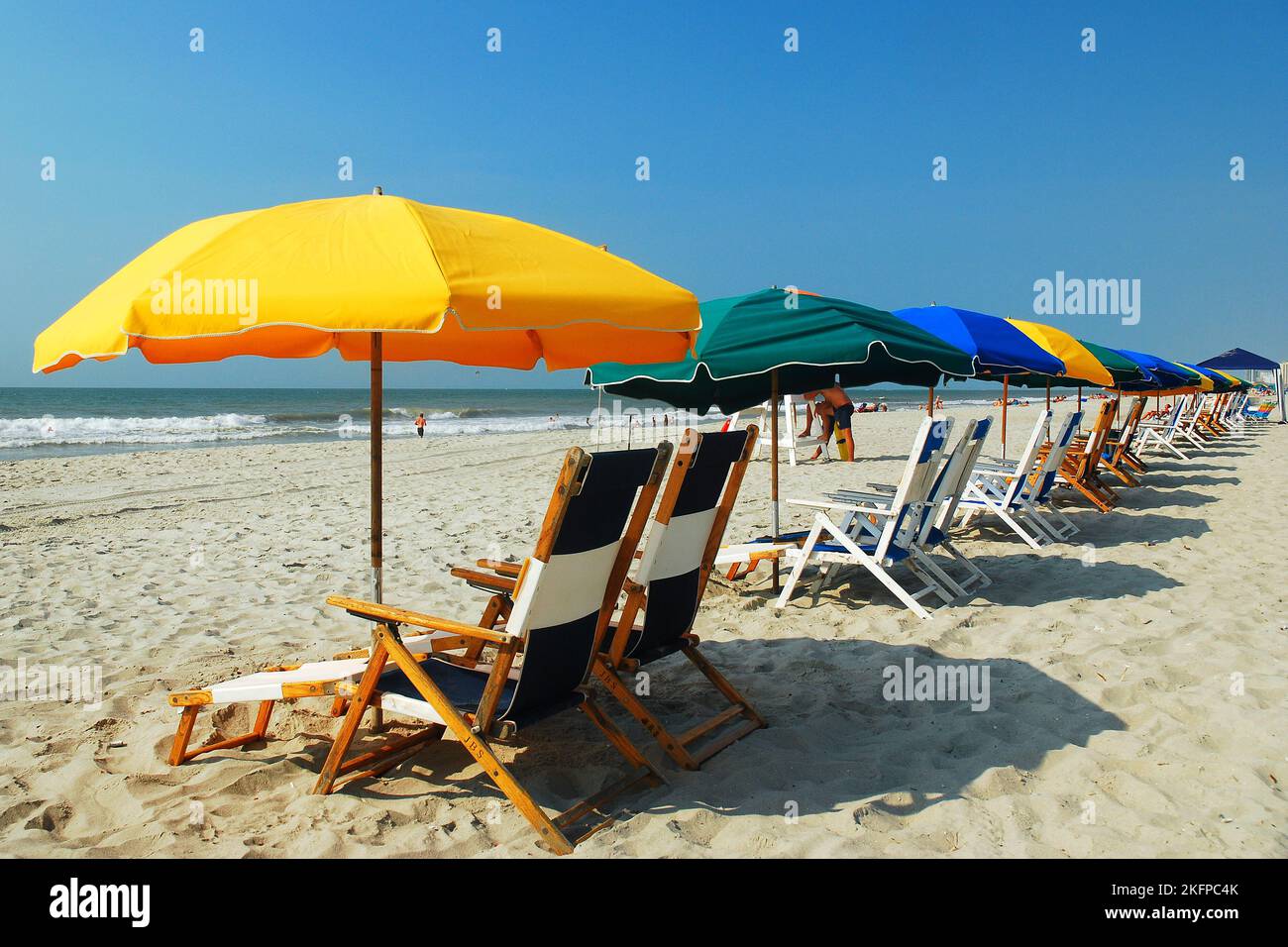 Umbrellas are lined up on the Grand Strand, of Myrtle Beach, South ...