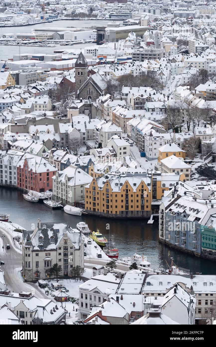 Snow-covered houses after a snowfall in Alesund, Norway Stock Photo - Alamy