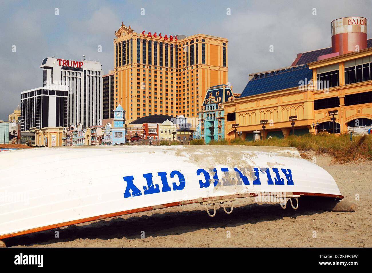 A lifeguard rowboat is overturned on the beach in front of the Atlantic ...