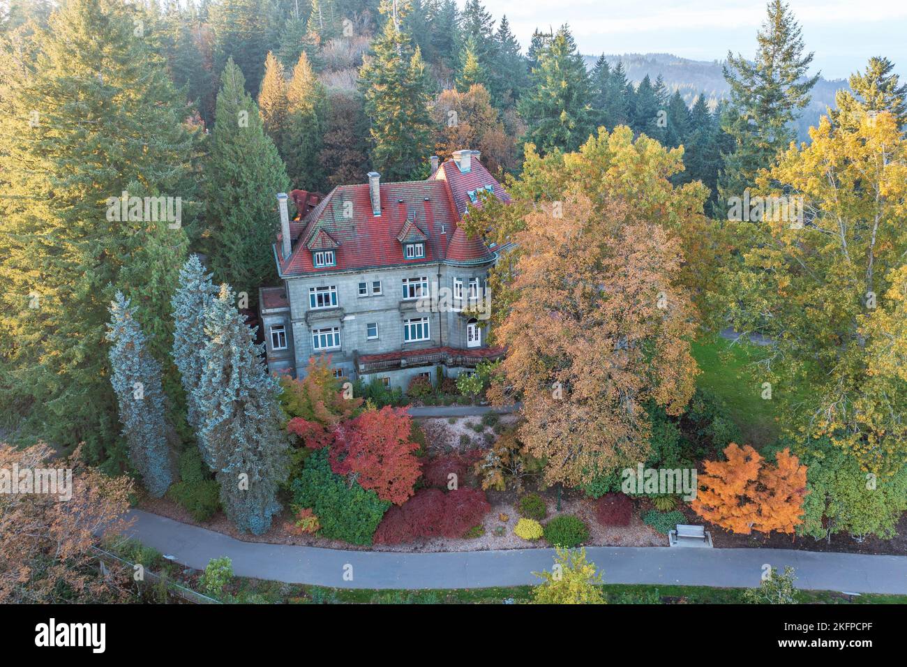 An aerial shot of pittock mansion surrounded by trees, Portland, Oregon ...