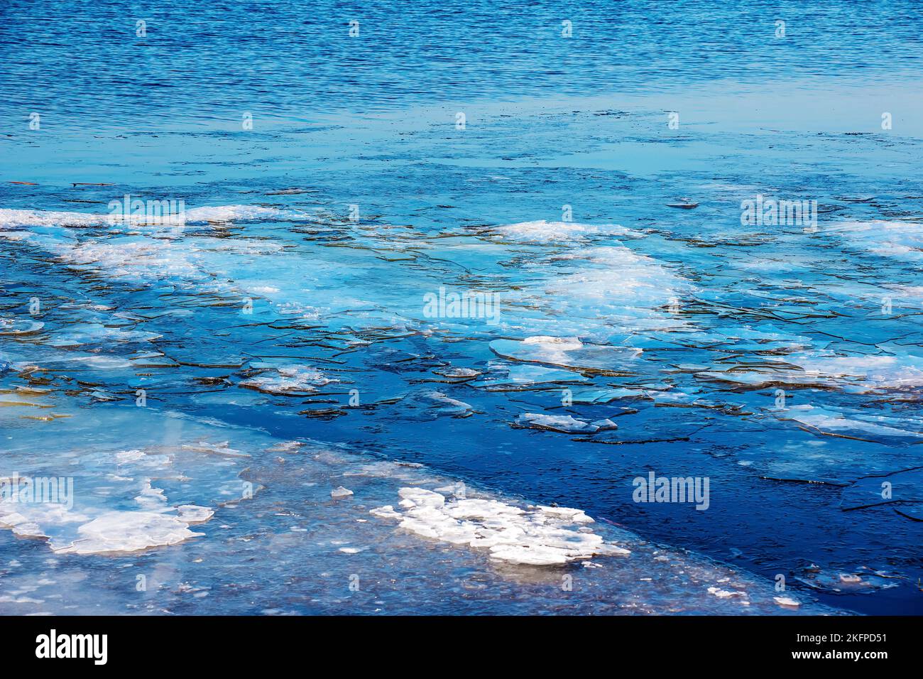Ice surface of the river. The texture of fragments of ice and water ...