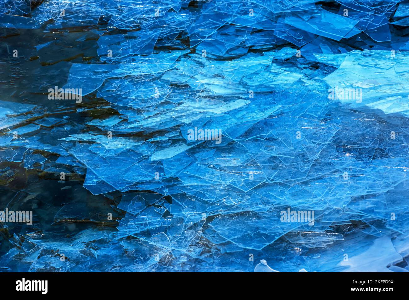 Ice surface of the river. The texture of fragments of ice and water ...