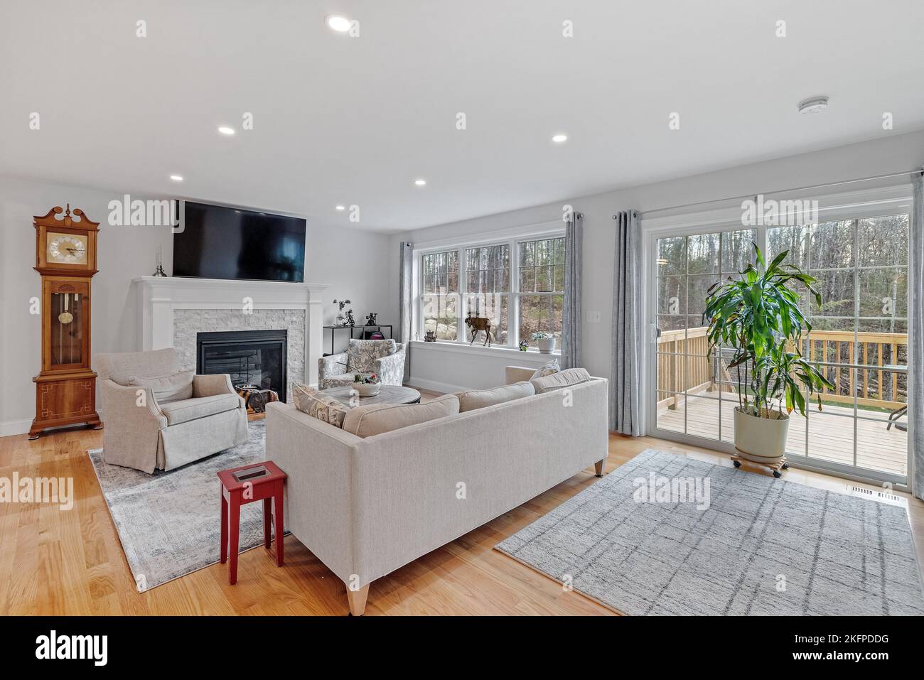 A set of furnitures inside the sitting room with a flat screen ...
