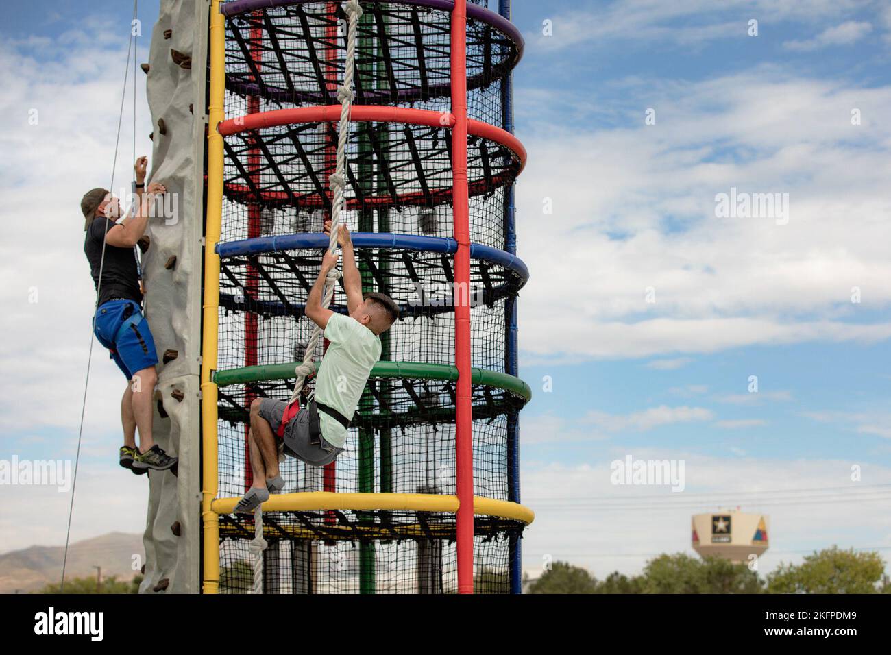 Soldiers takes to the rock wall at the 2022 B.O.S.S. Bash at Fort Bliss ...