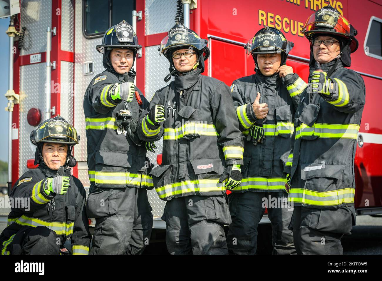 Installation firefighters pose for a group photo during the USAG ...