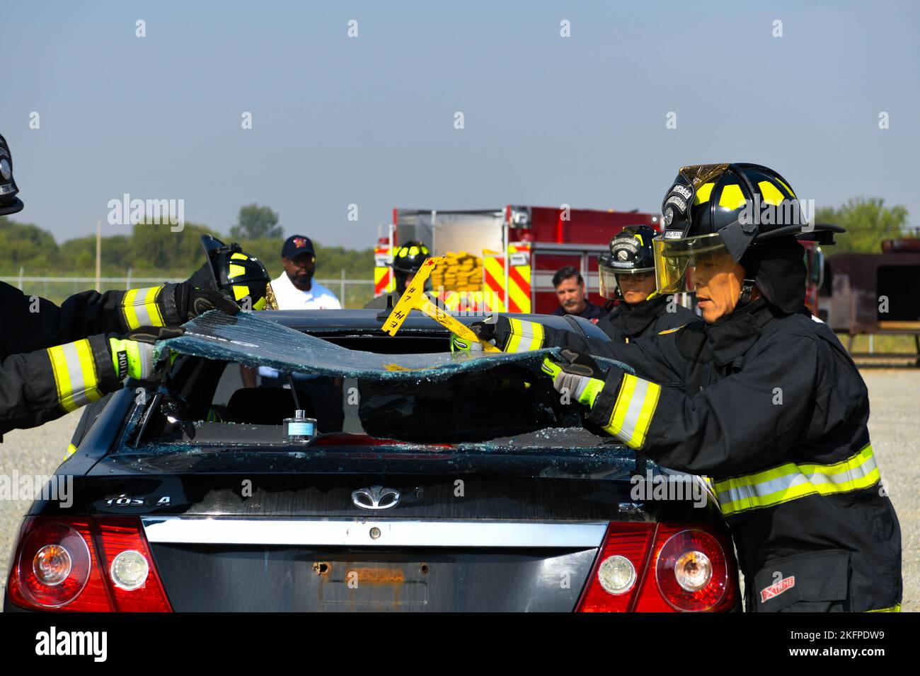 Installation firefighters participate in a vehicle extraction ...