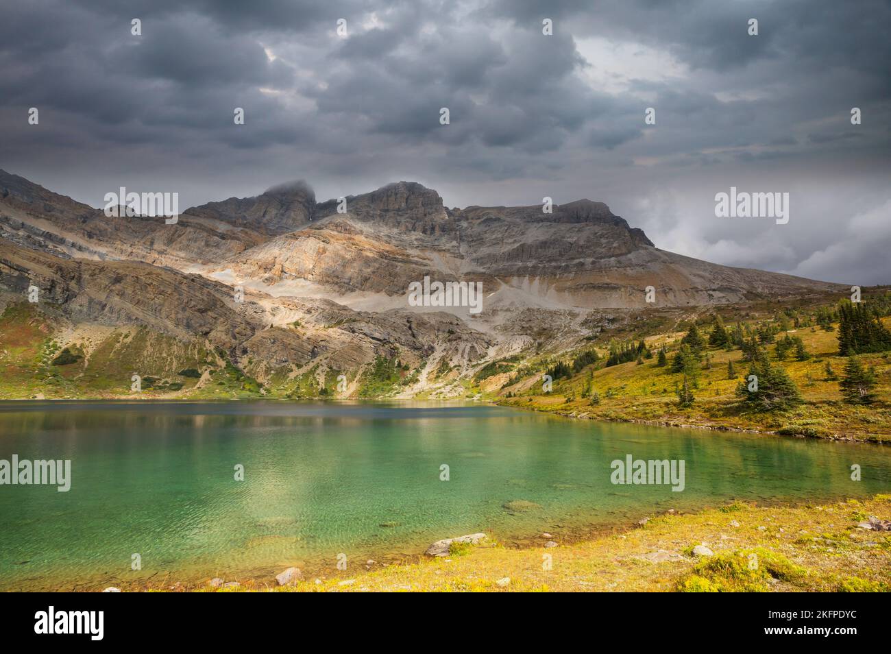Serene scene by the mountain lake in Canada Stock Photo - Alamy