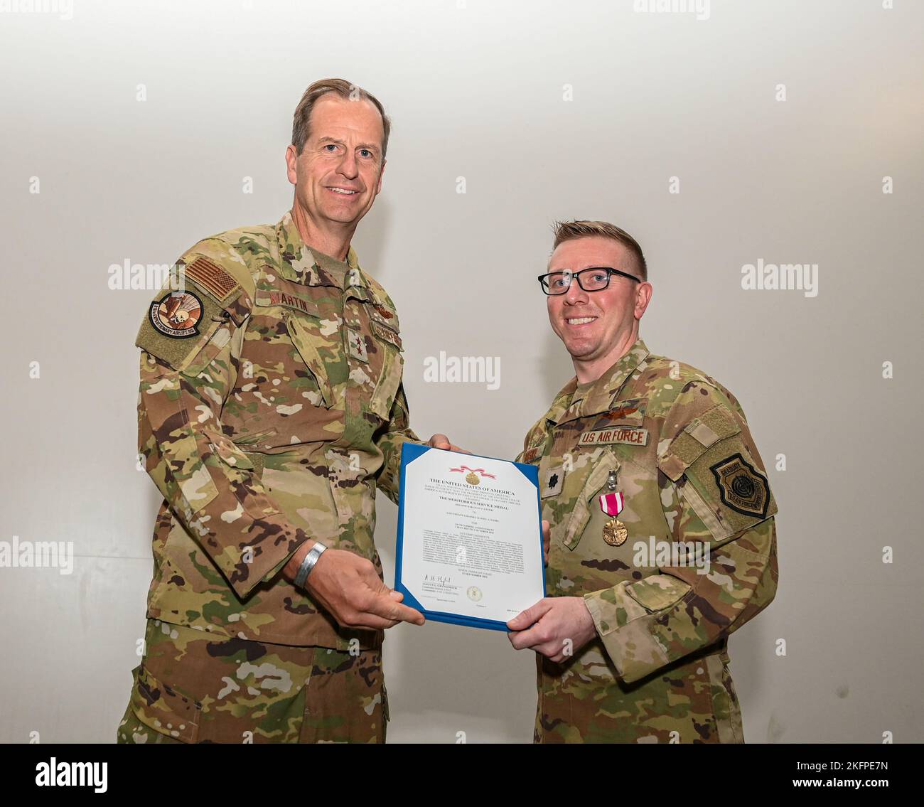 U.S. Air Force Maj. Gen. Corey Martin, 18th Air Force Commander (left ...