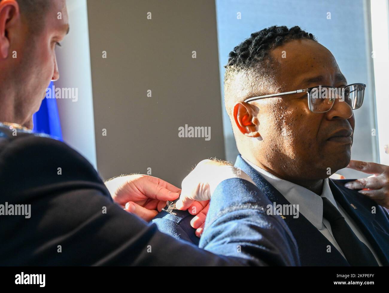 Col. Michael Parks, 507th Air Refueling Wing commander, pins the rank ...