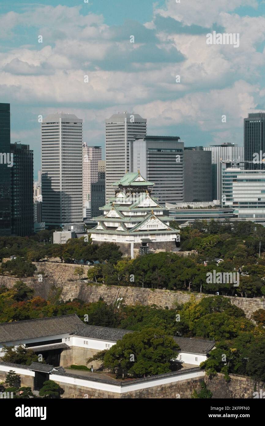 Osaka Castle with skyscrapers in the background Stock Photo - Alamy