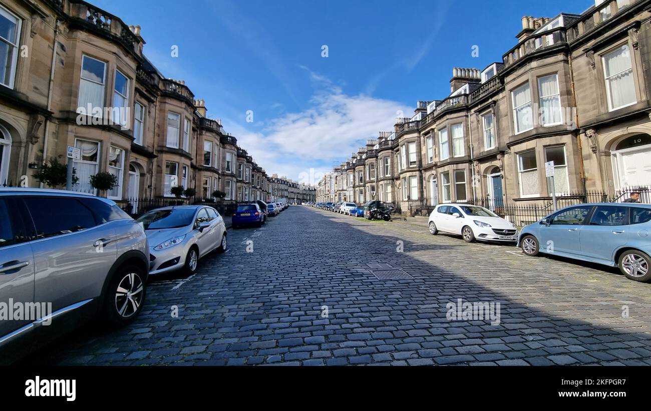 A brick walkway surrounded by urban buildings in Edinburgh Scotland ...