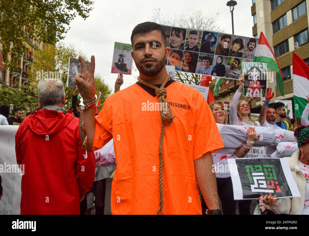 London, England, UK. 19th Nov, 2022. A protester wearing an orange ...