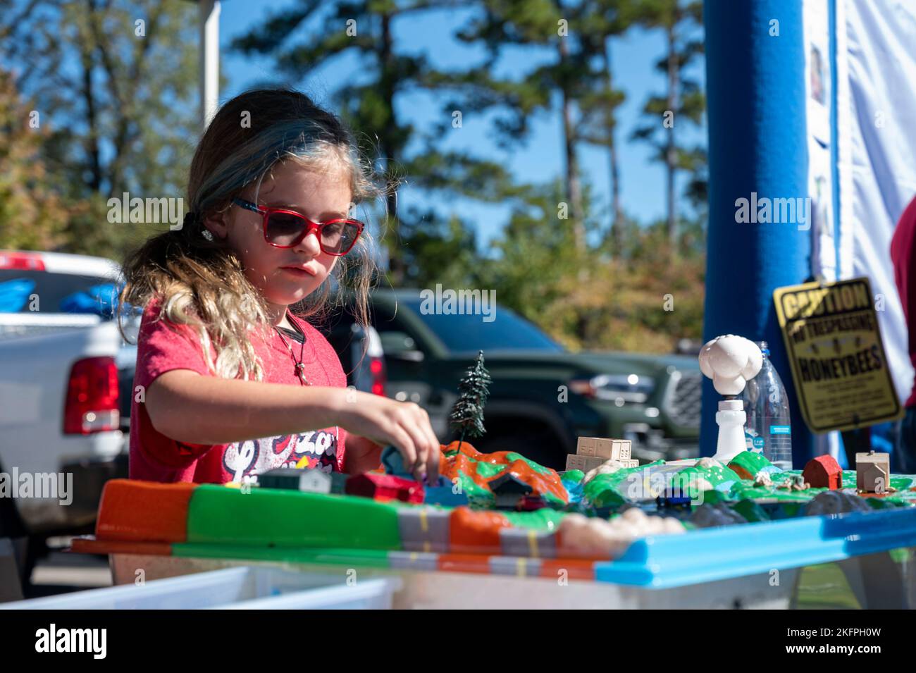 A child interacts with a display during the DoD STARBASE STEM Fest at ...