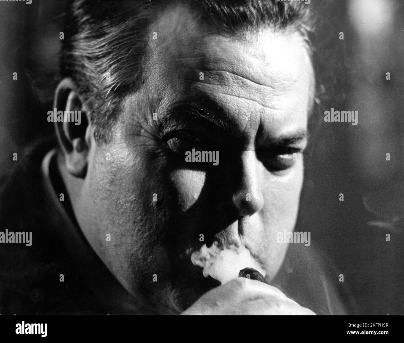 ORSON WELLES on set candid portrait with cigar during filming of IS ...