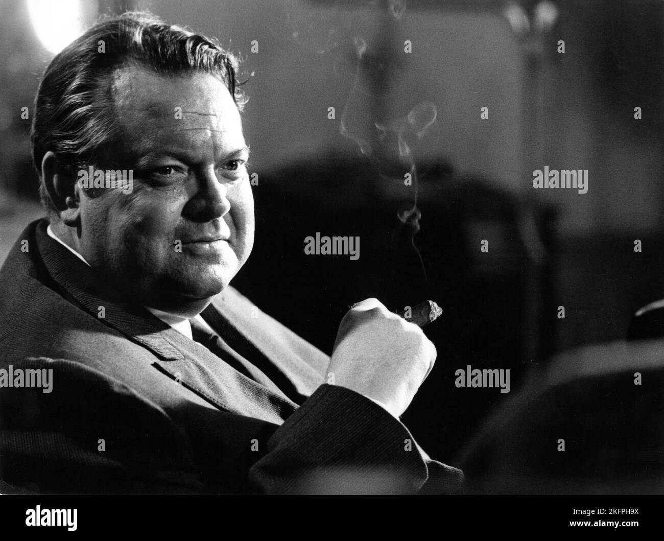 ORSON WELLES on set candid portrait with cigar during filming of IS ...