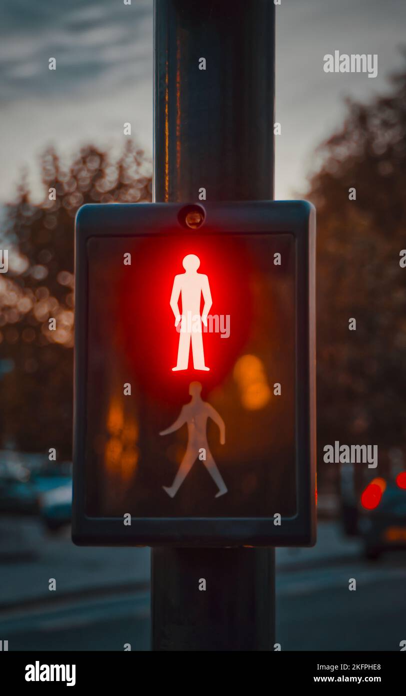 Red traffic symbol at crossing lights in Lincoln Town Centre ...