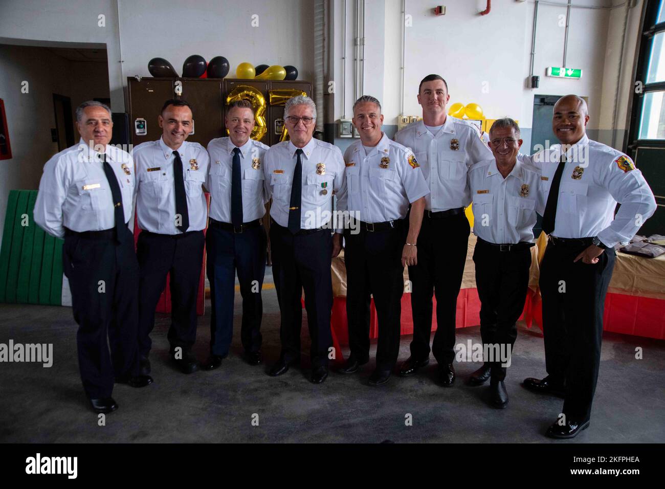 NAPLES, ITALY –– Italian Fire Chief Giovanni Rippa, center, poses for a ...