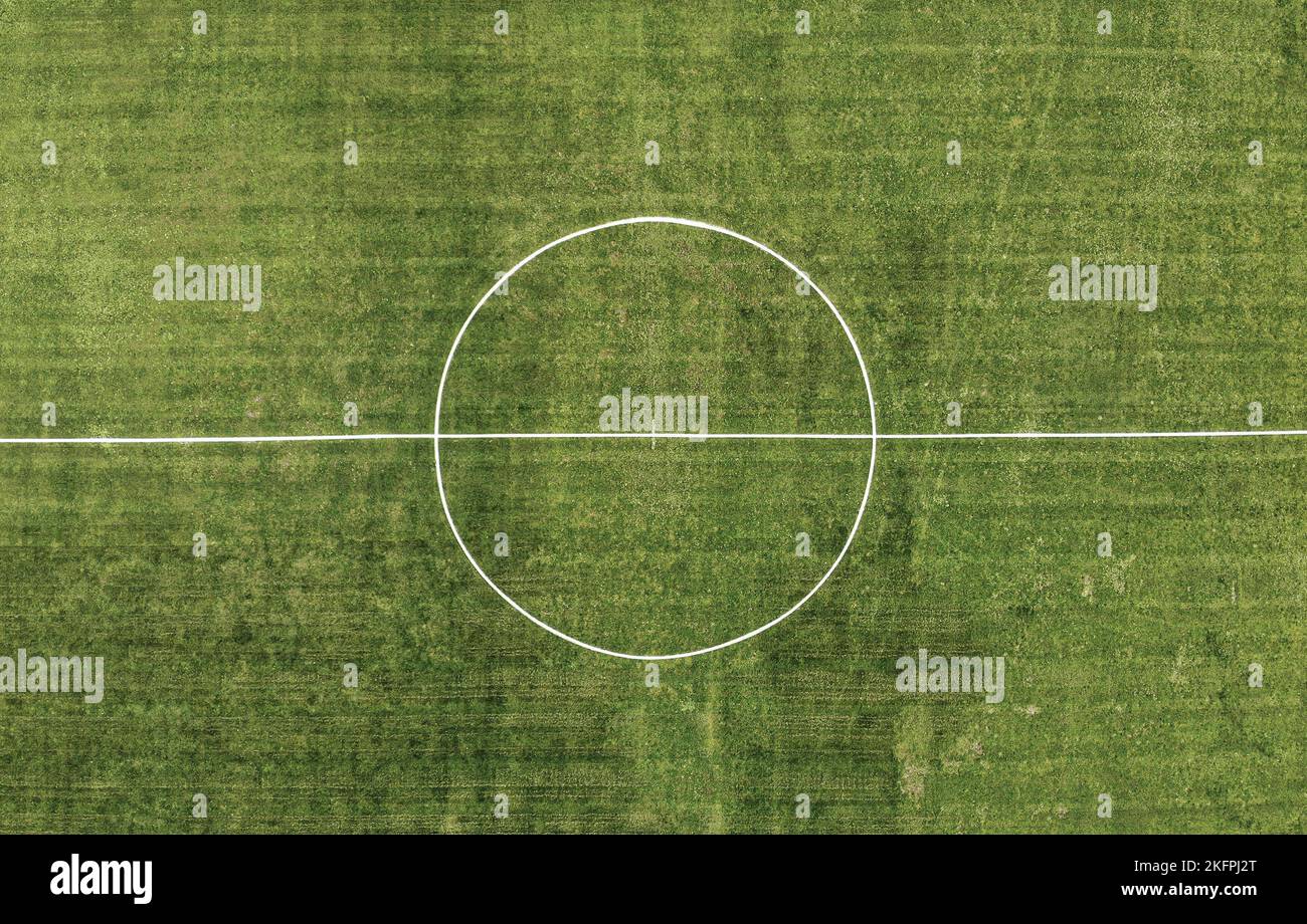 An aerial top shot of the center circle in the green soccer field Stock ...