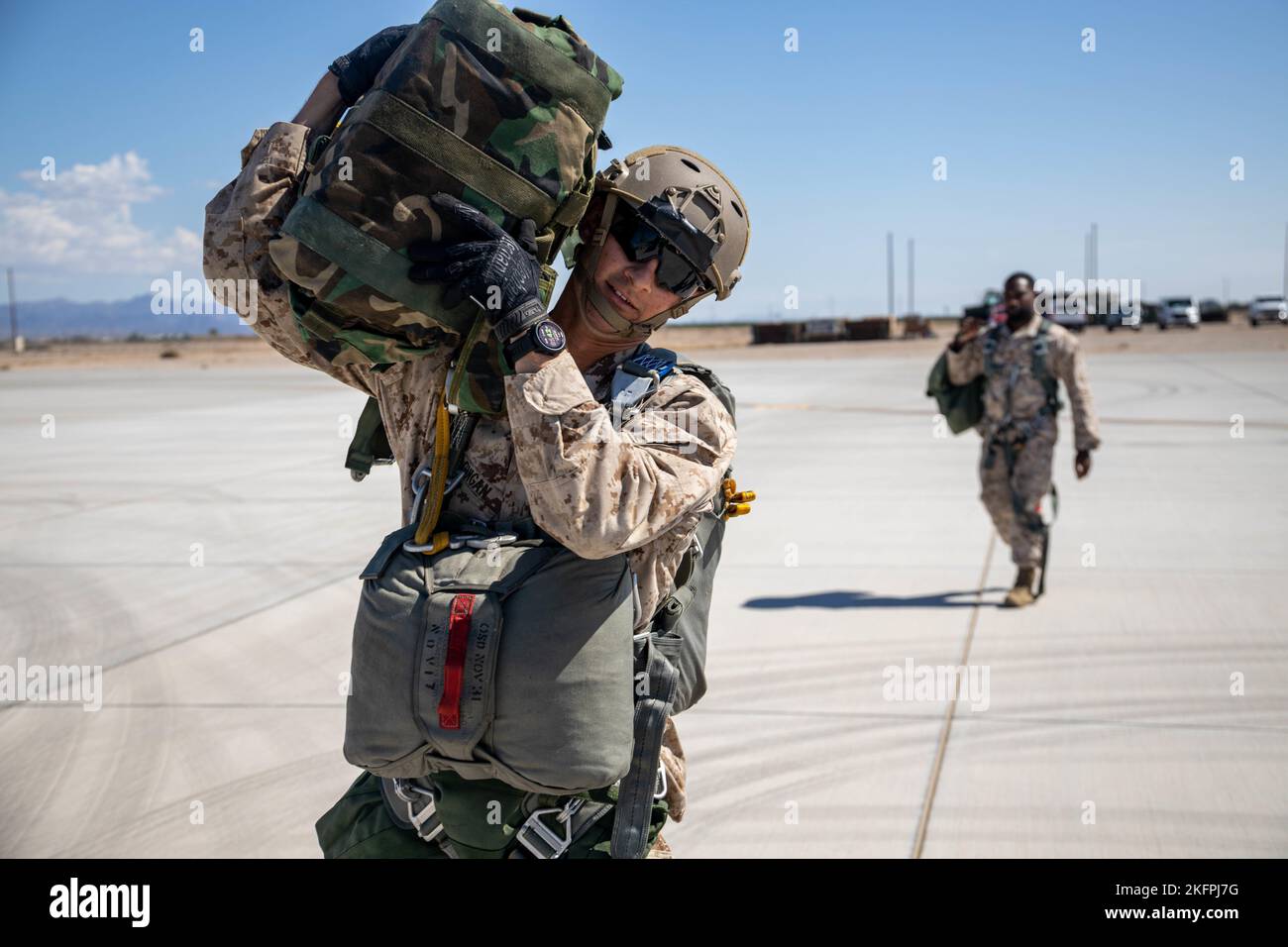 U.S. Marine Corps Capt. Avalon McGuigan, foreground, from Washington, D ...