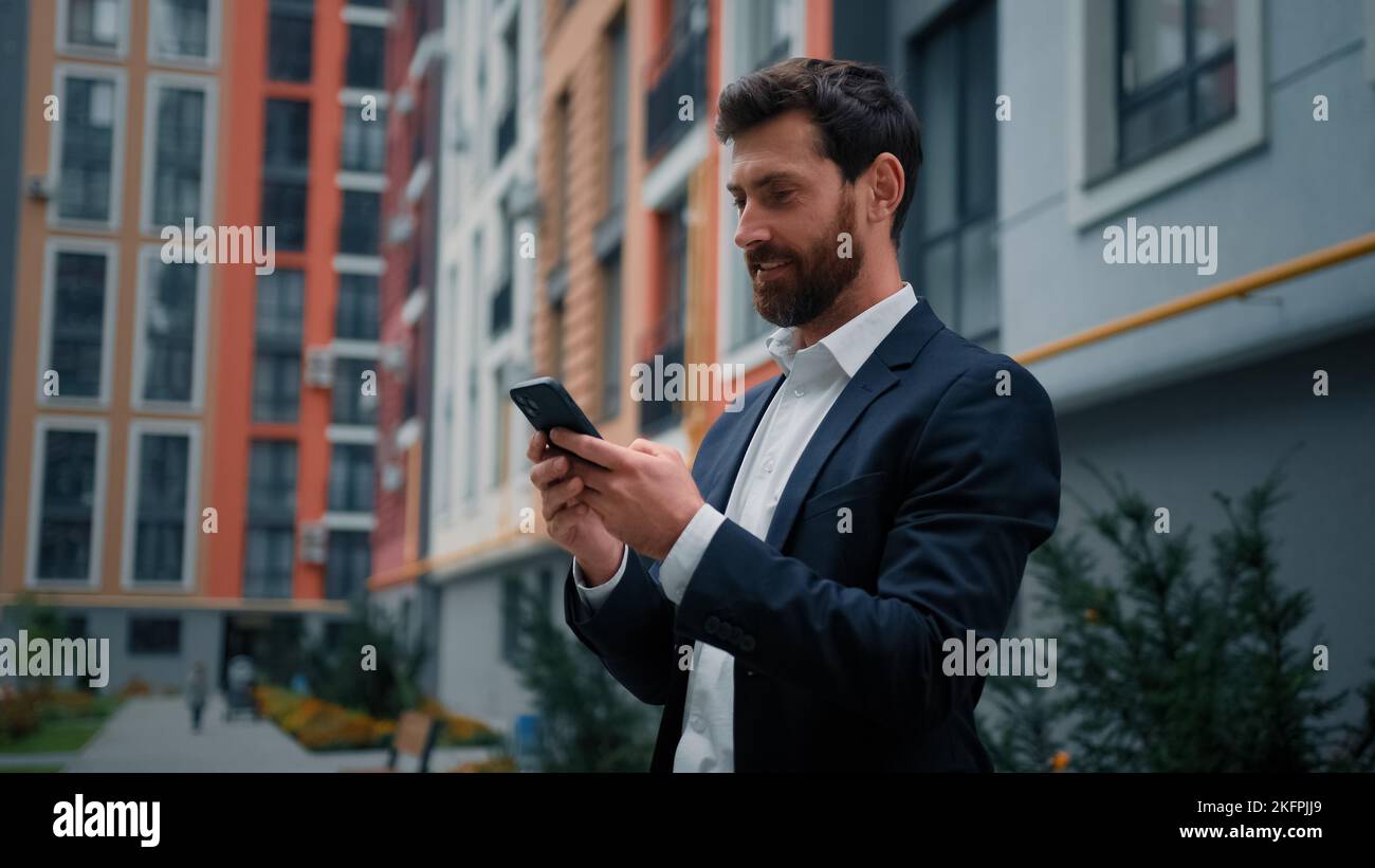 Handsome successful businessman caucasian man stand near modern ...