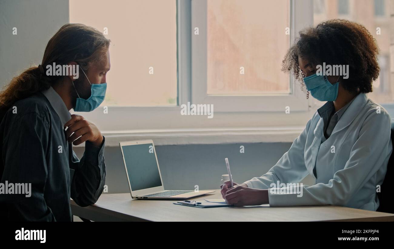 Professional doctor african woman therapist consult sick man patient ...